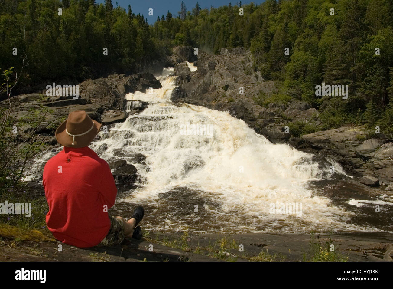man watching waterfalls Stock Photo - Alamy