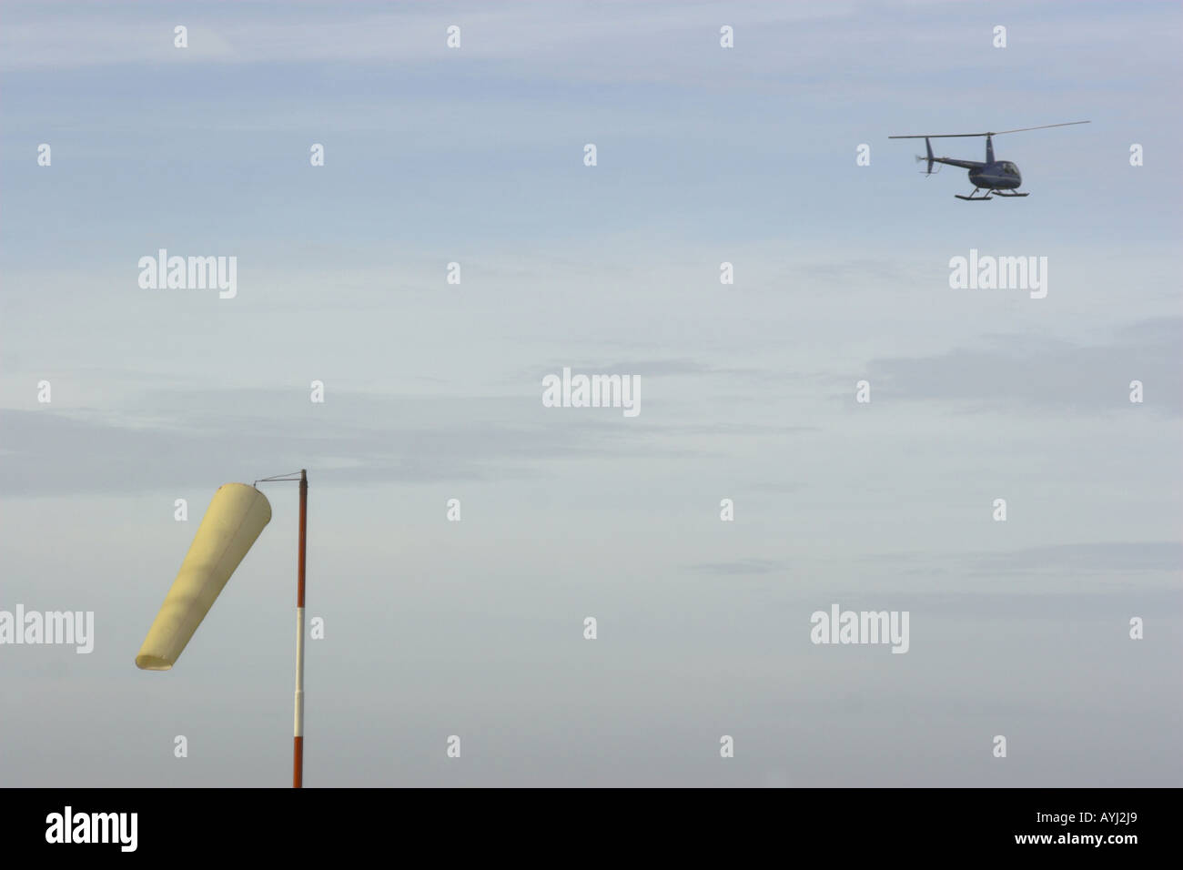Wind sock and helicopter Stock Photo - Alamy