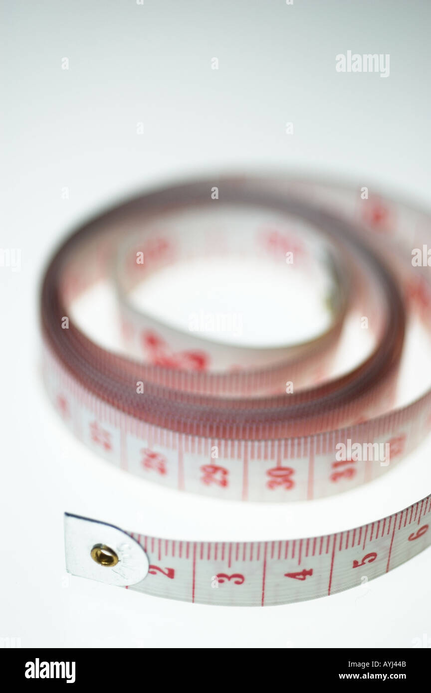 Tape measure on a white background Stock Photo - Alamy