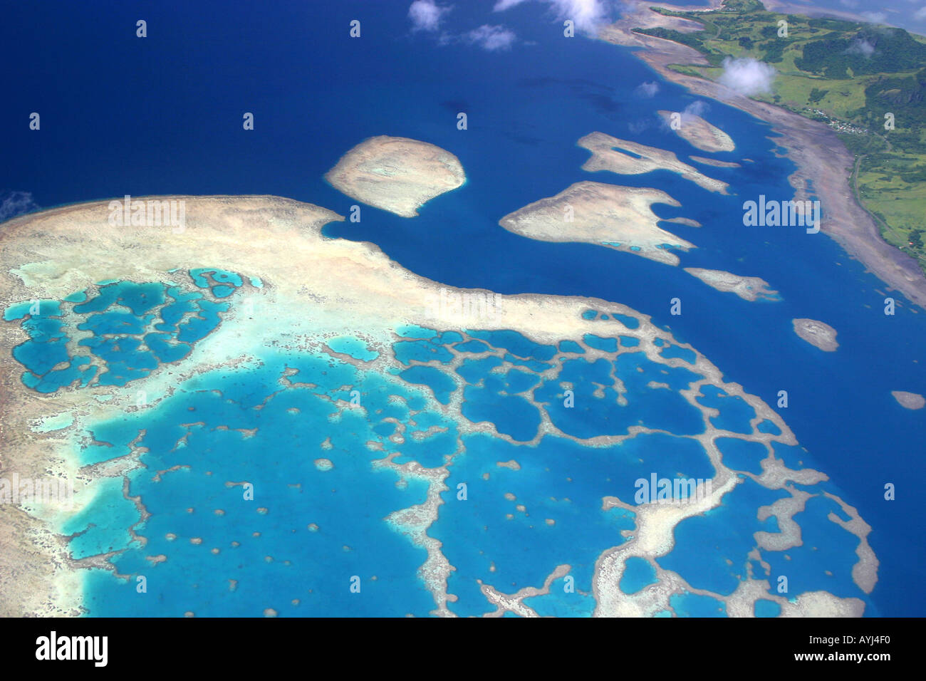 Aerial view of beautiful coral reef taken from an aeroplane flying over ...