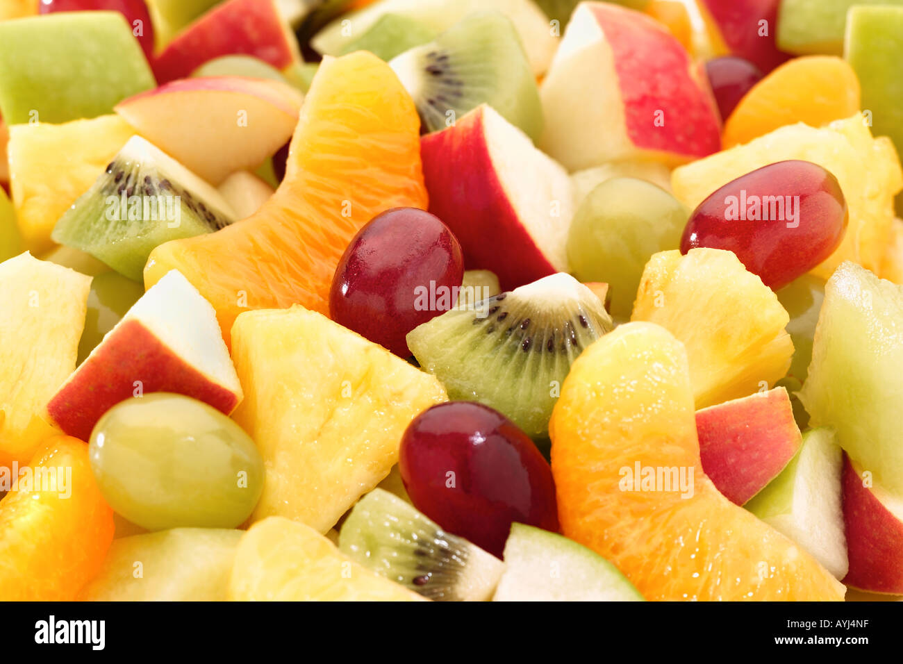 Grape pineapple apple fruit salad hi-res stock photography and images ...