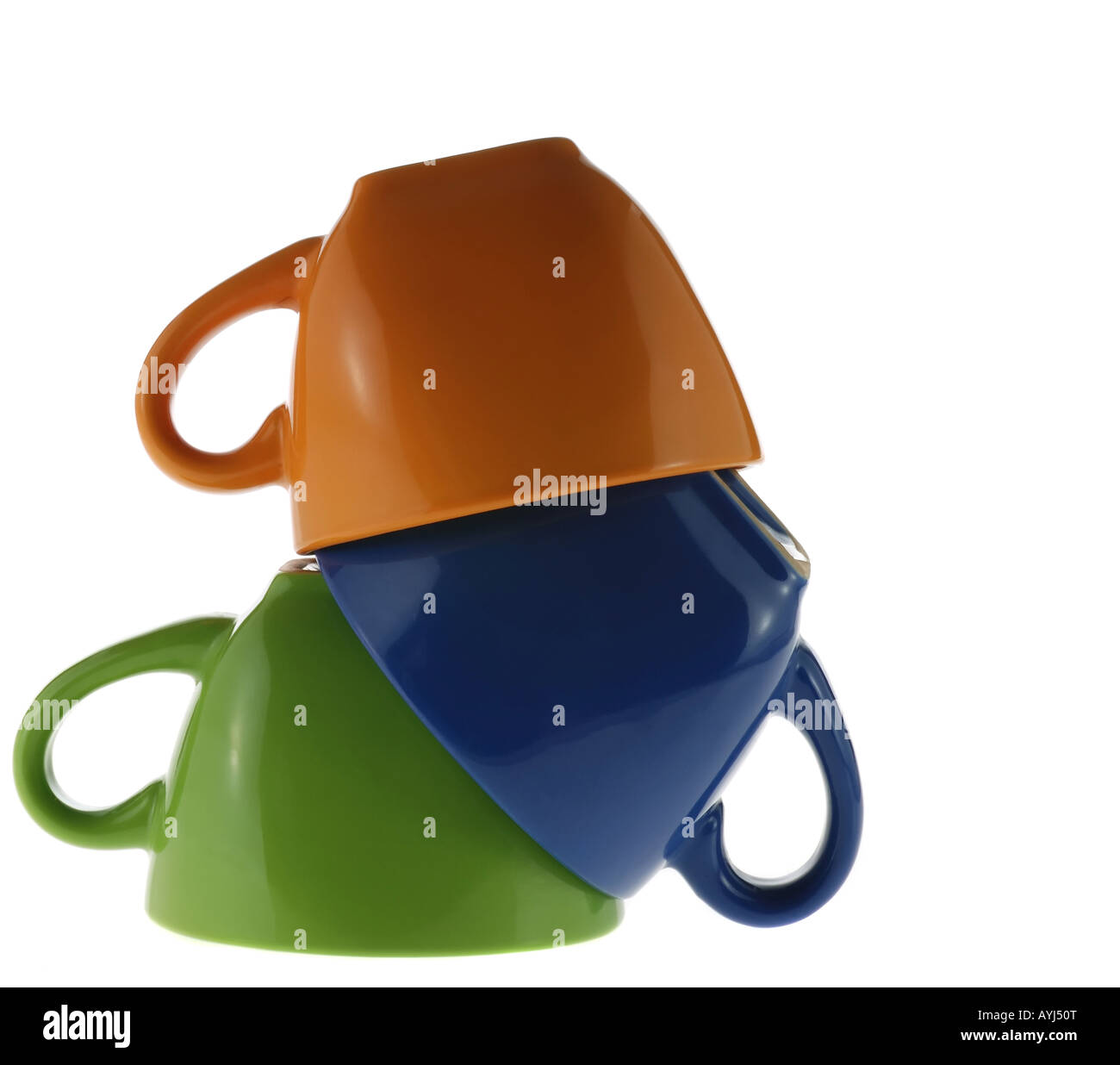 Three turned color cups Ceramic service from color cups Stock Photo - Alamy