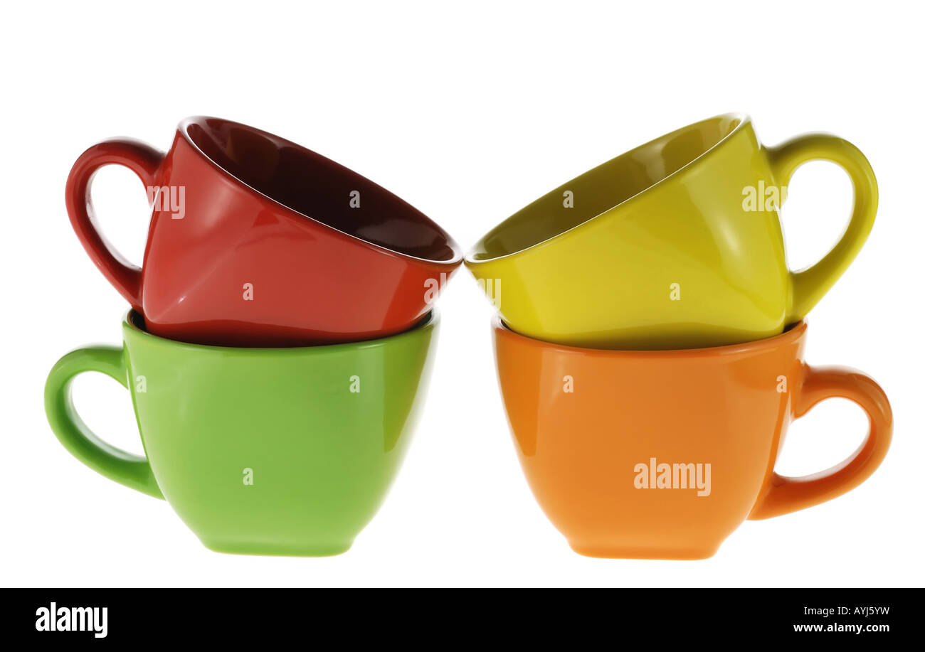 four cups Ceramic service from color cups Stock Photo - Alamy