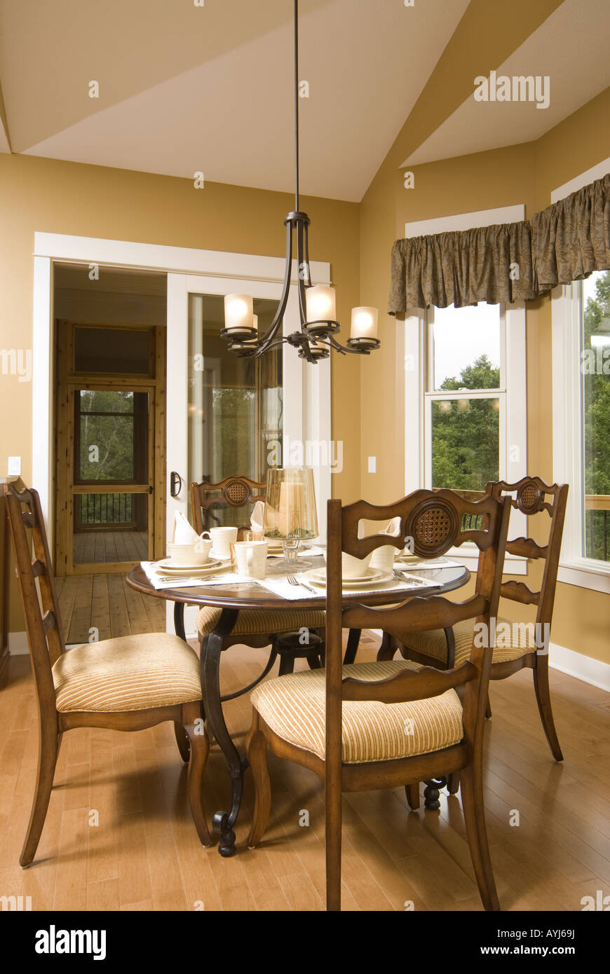 American dining room interior with table and chairs Stock Photo - Alamy
