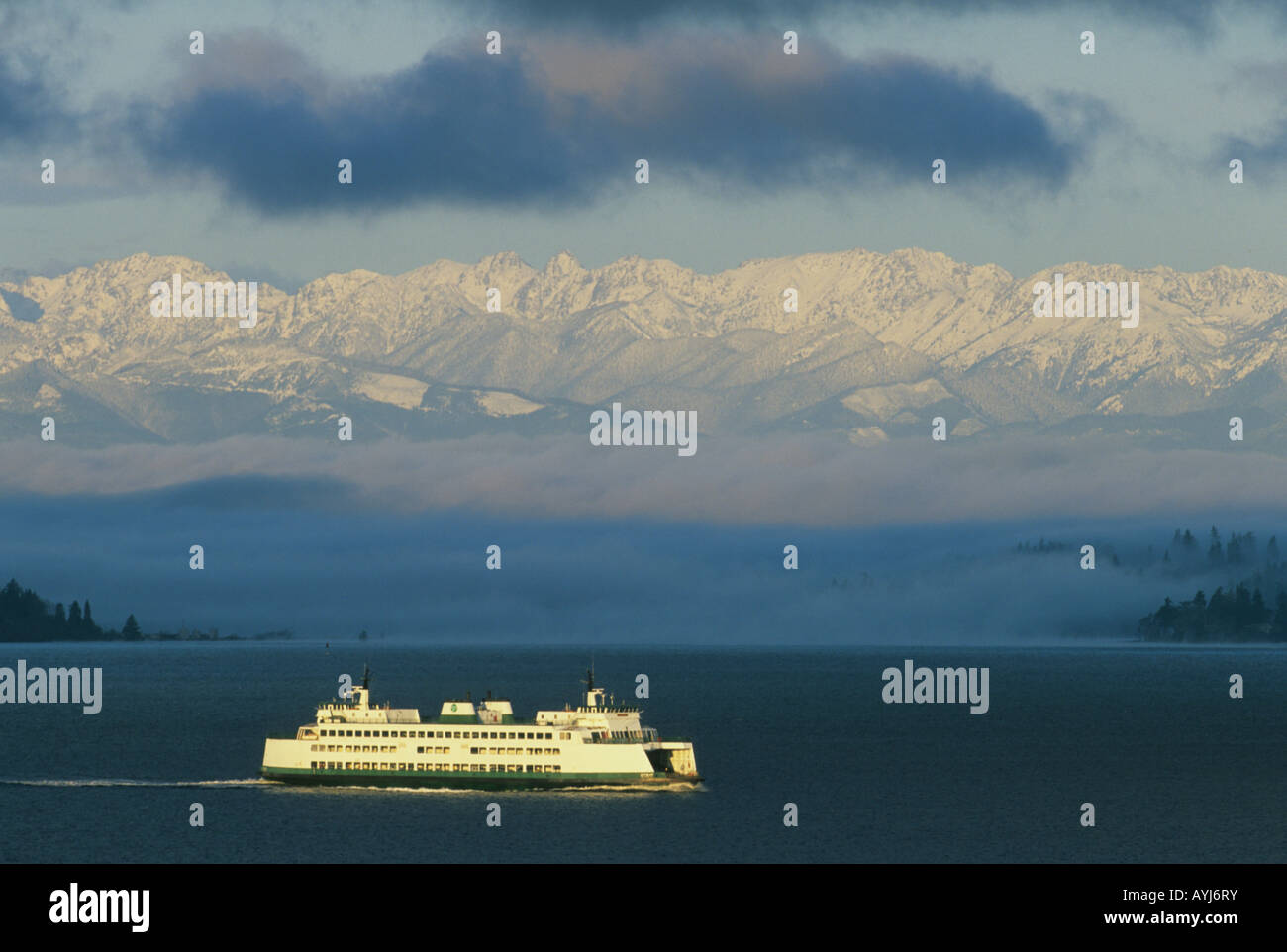 USA, Washington State, ferry crosses Puget Sound winter, Olympic ...