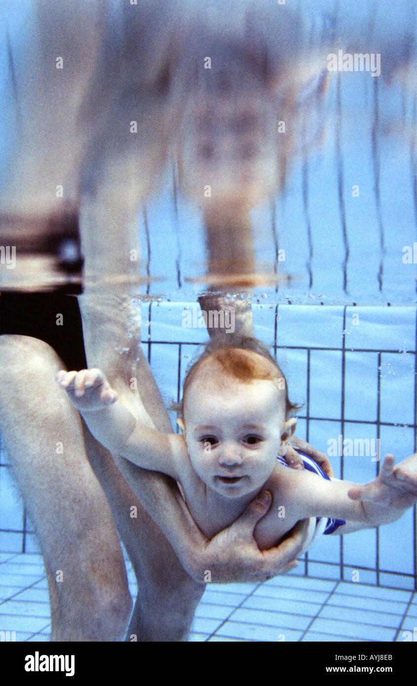 One year old boy learning to swim Stock Photo - Alamy
