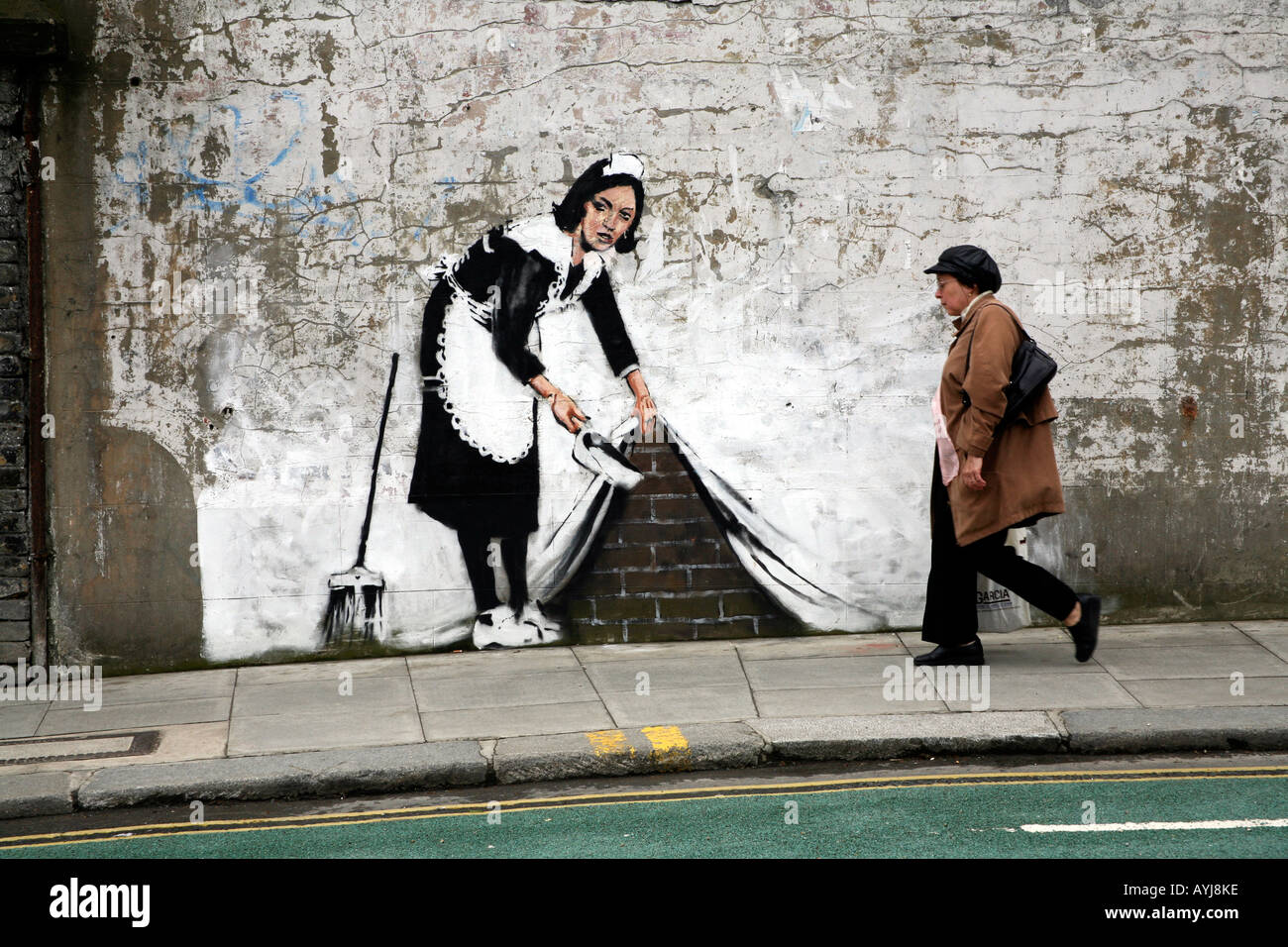 Banksy Maid Sweeping it Under the Carpet, Chalk Farm, London Stock ...