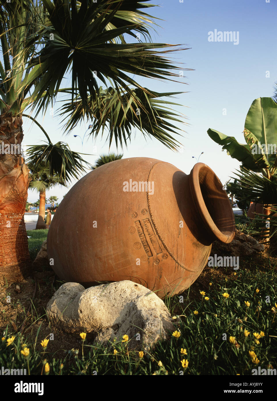 Mallorca Large pitoi pot Urn On side Palm trees Stock Photo - Alamy
