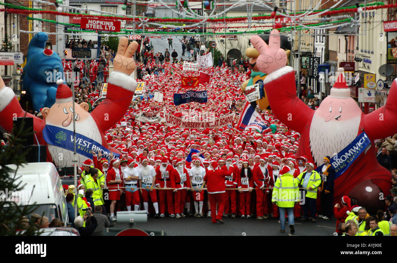 Santas running hi-res stock photography and images - Alamy