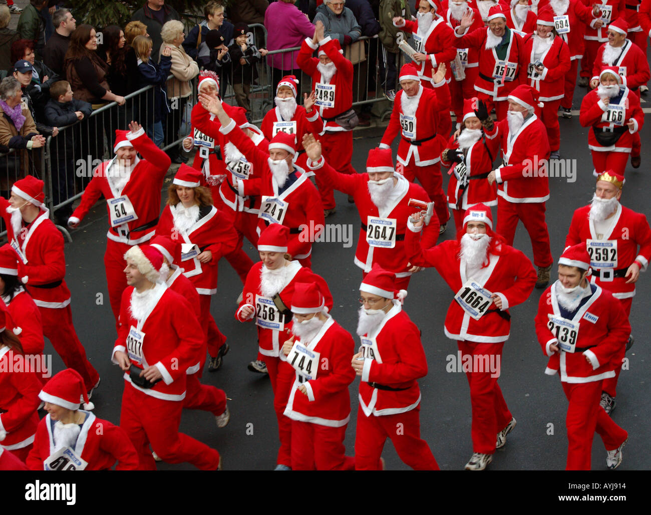 Santas running hi-res stock photography and images - Alamy