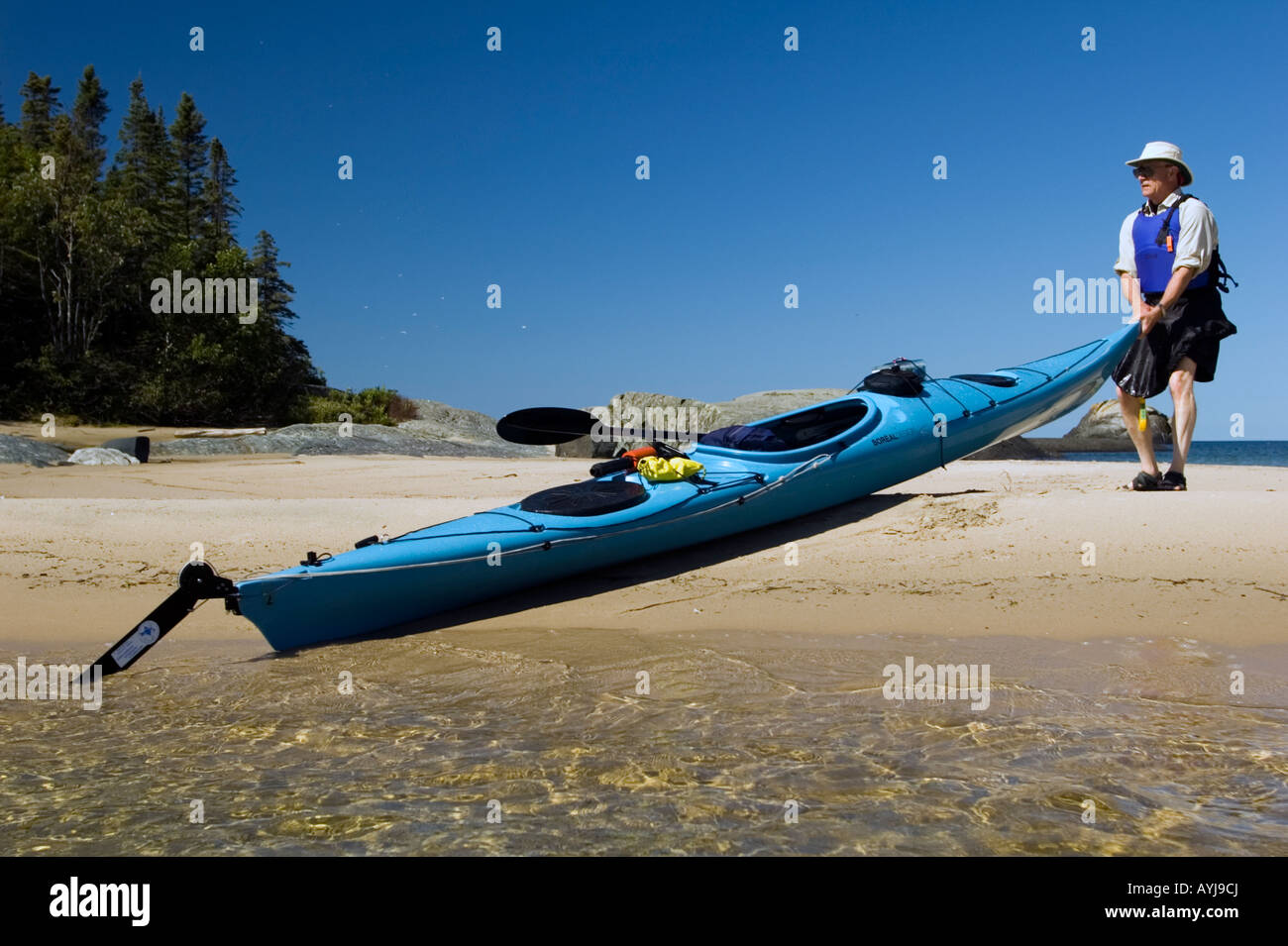 Man pulling kayak hi-res stock photography and images - Alamy