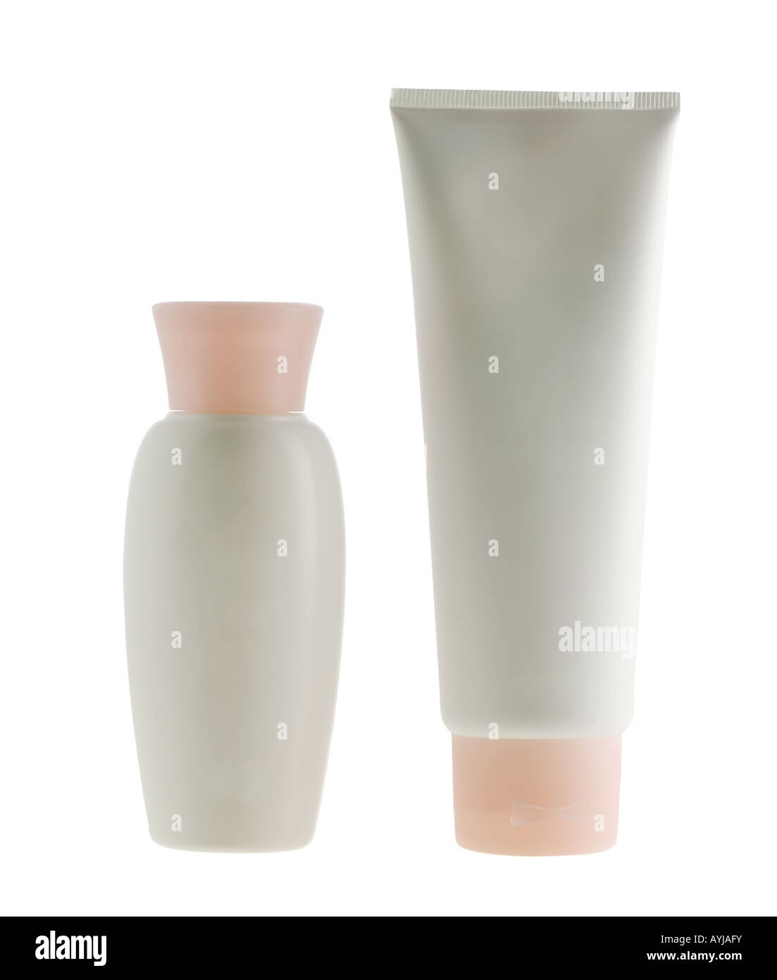 White tubes of a cream with pink covers Stock Photo - Alamy