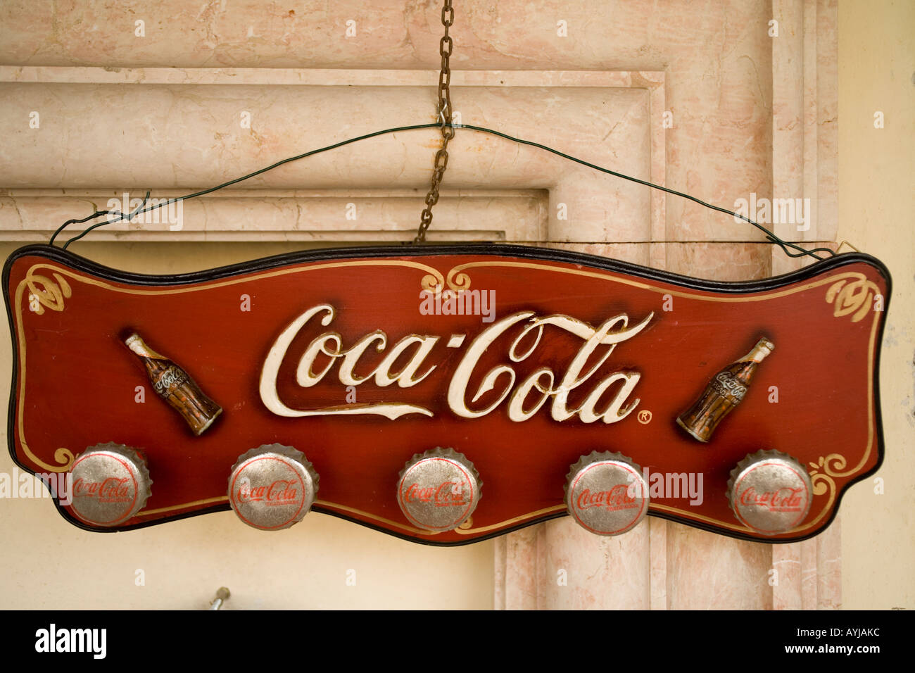 Antique Coca Cola coat- hanger Stock Photo - Alamy