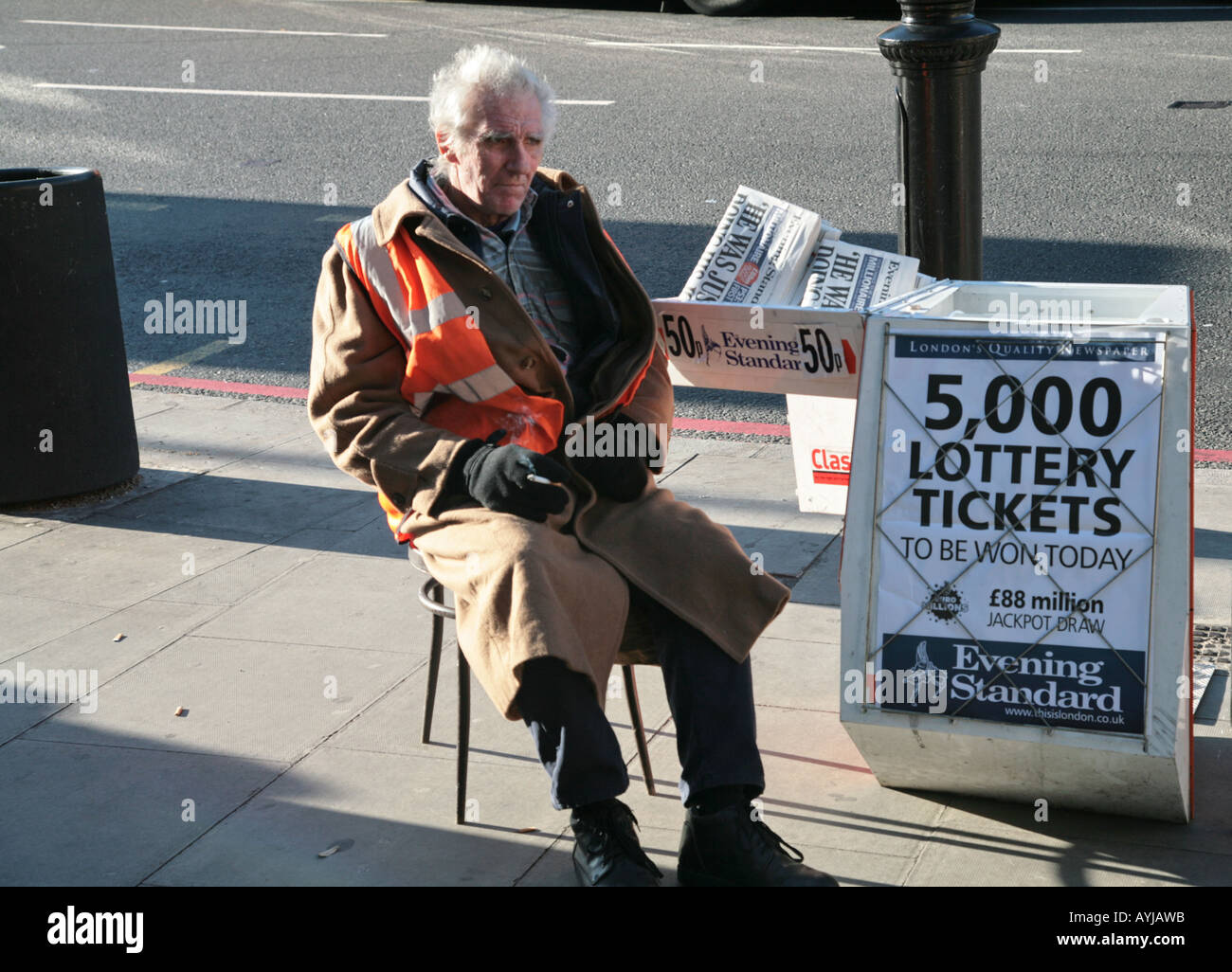 The newspaper vendor hi-res stock photography and images - Alamy