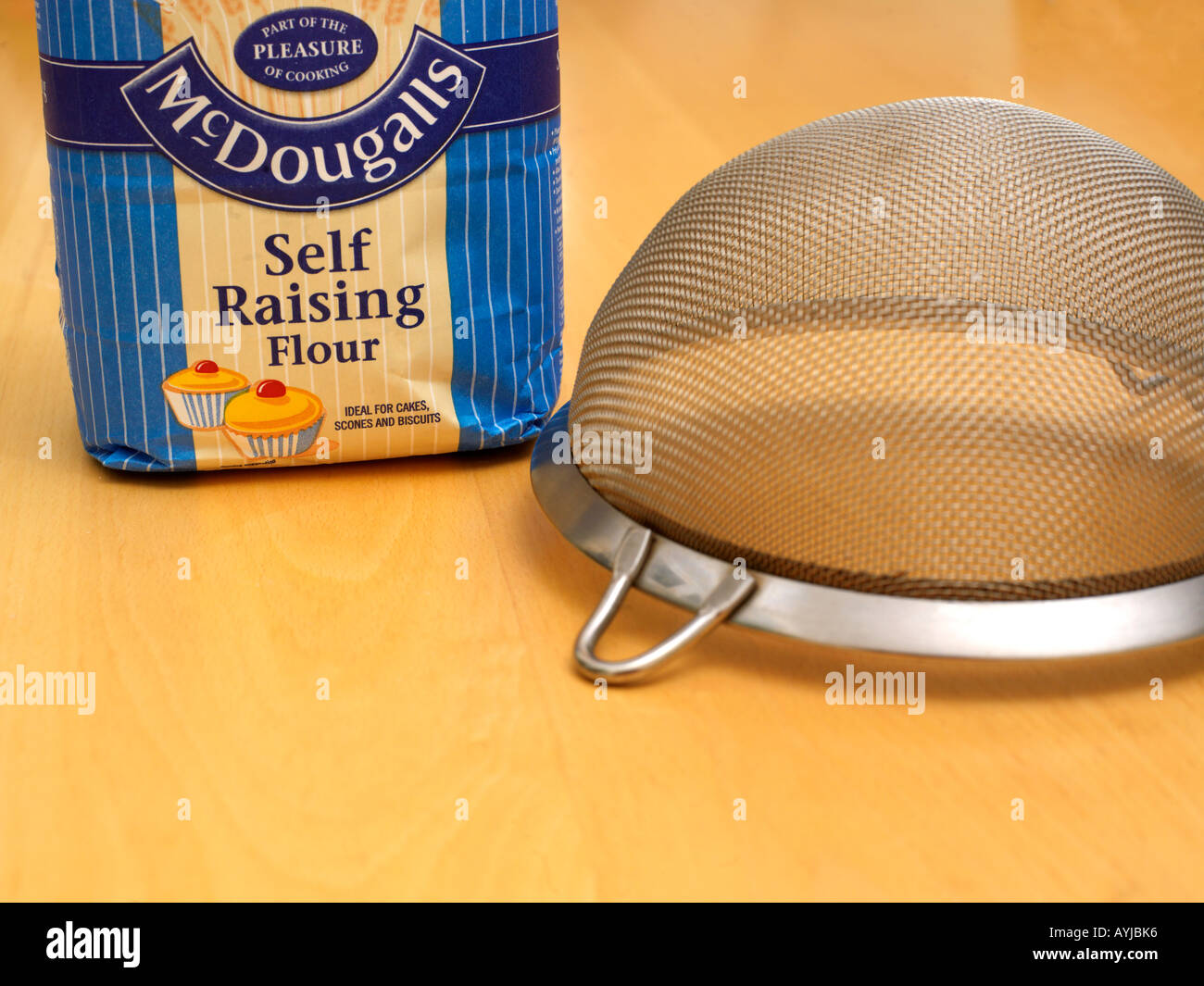 Self Raising Flour and Sieve Stock Photo - Alamy