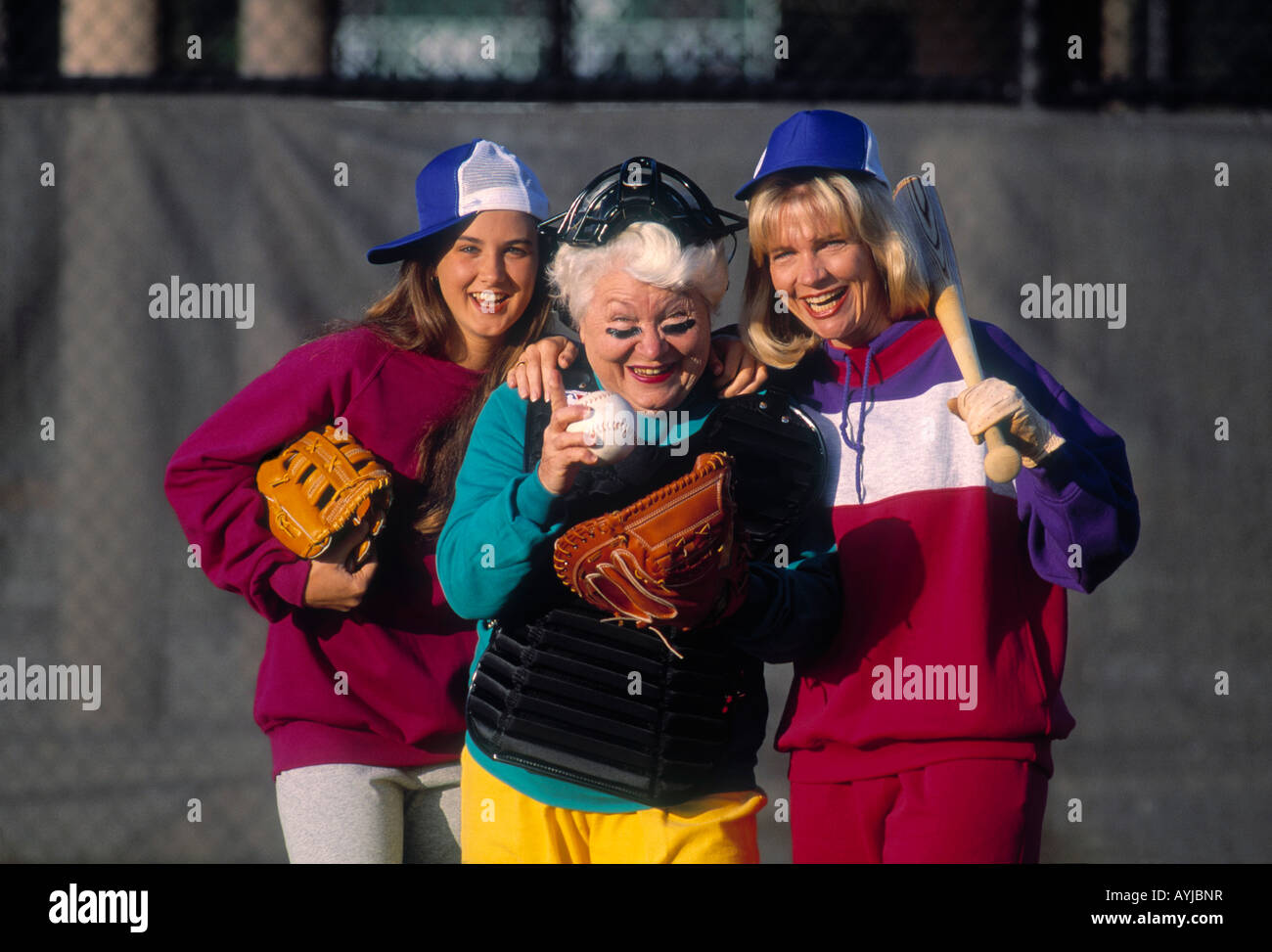 Three generations female softball players,grandmother, mother, and ...