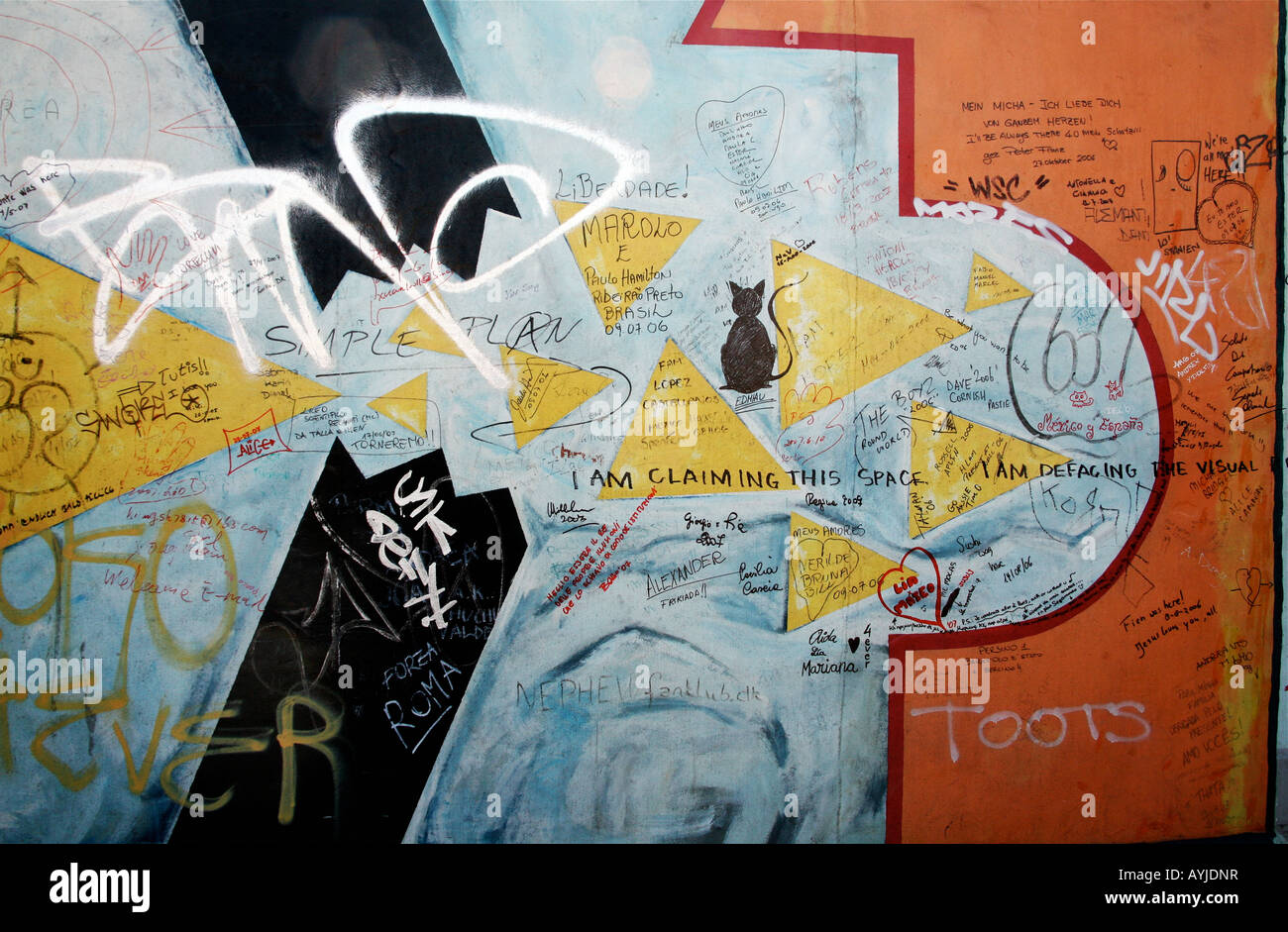 Street art near the Berlin Wall. Colorful symbolic drawings Stock Photo ...