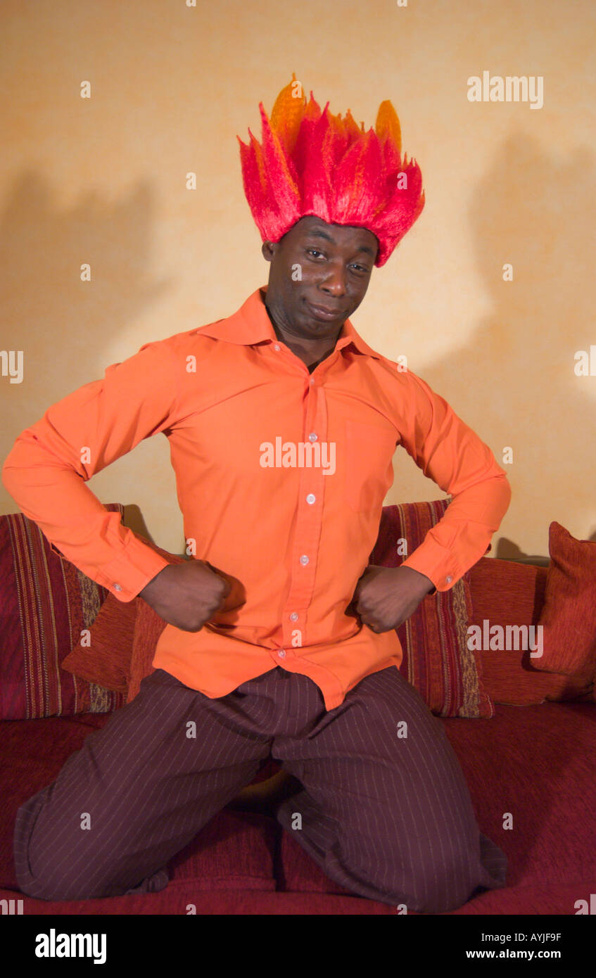 man wearing flame wig Stock Photo - Alamy