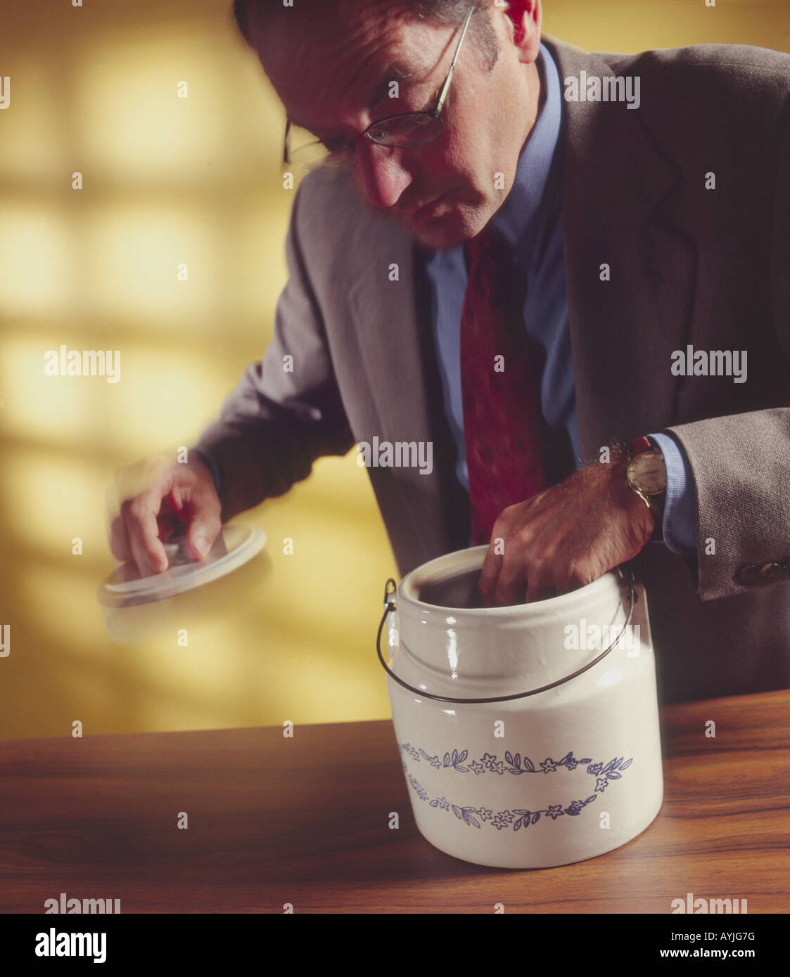 man with hand in cookie jar Stock Photo - Alamy