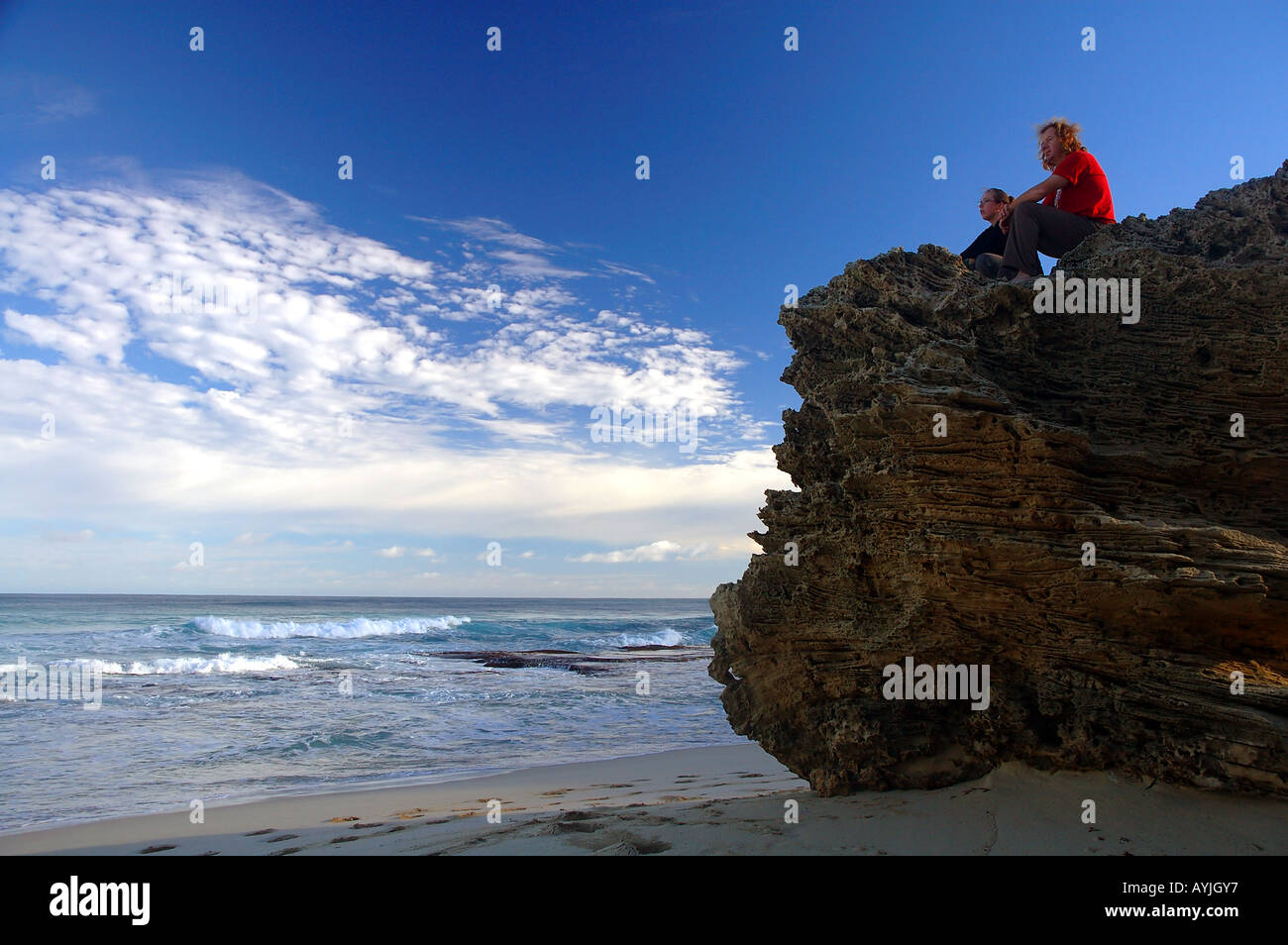 Couple watching the sea Stock Photo - Alamy