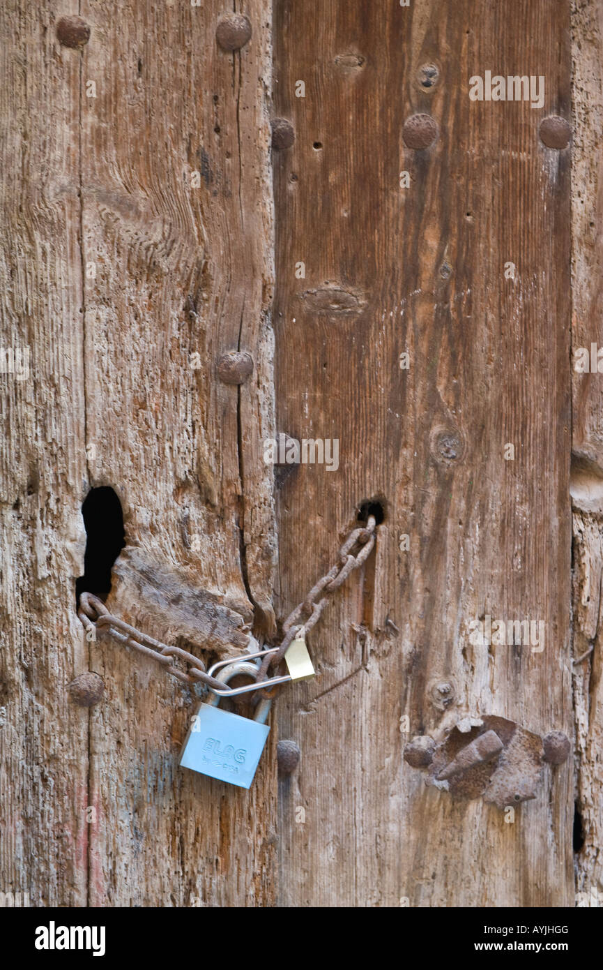 Old door with padlock Tarragona Spain Europe Stock Photo - Alamy