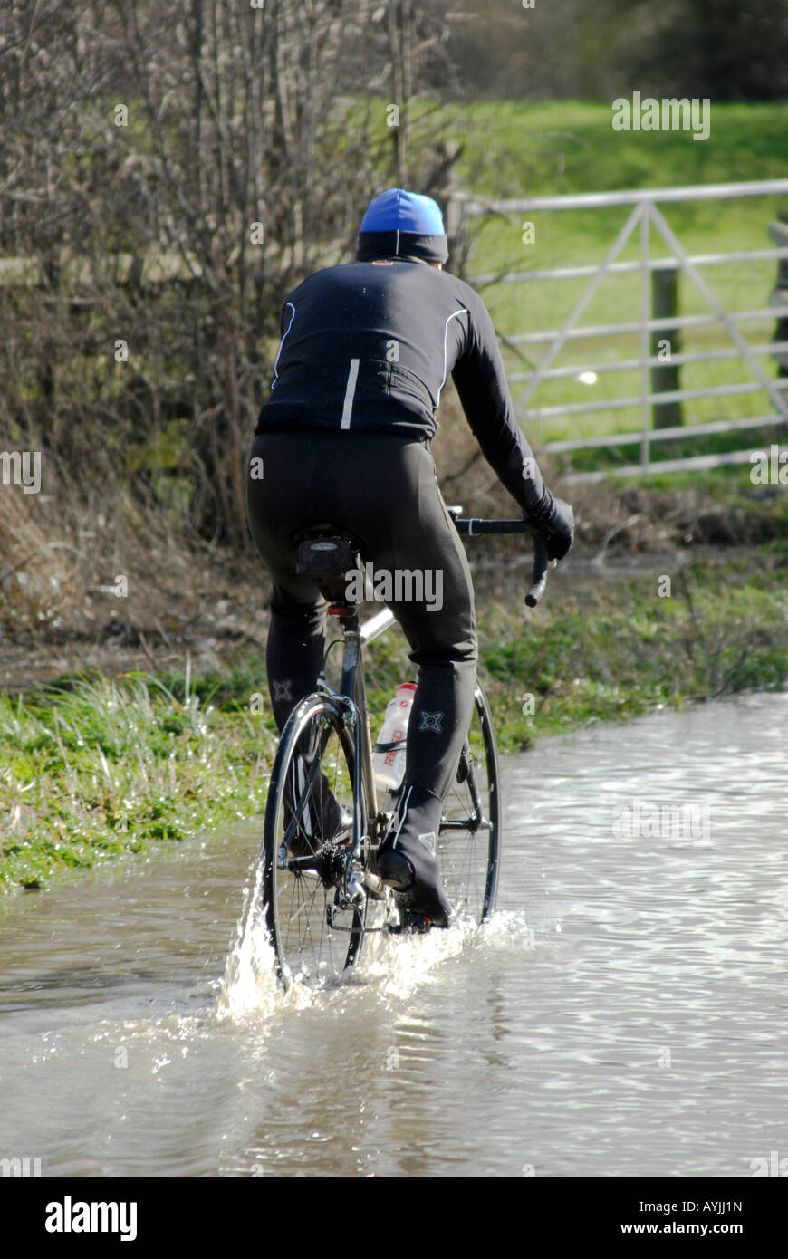 Cycling in flooded water hi-res stock photography and images - Alamy