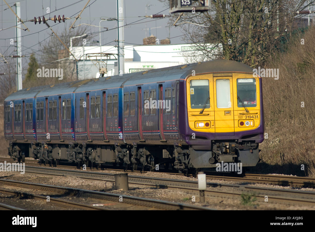 class 319 electric train in first capital connect livery travelling ...