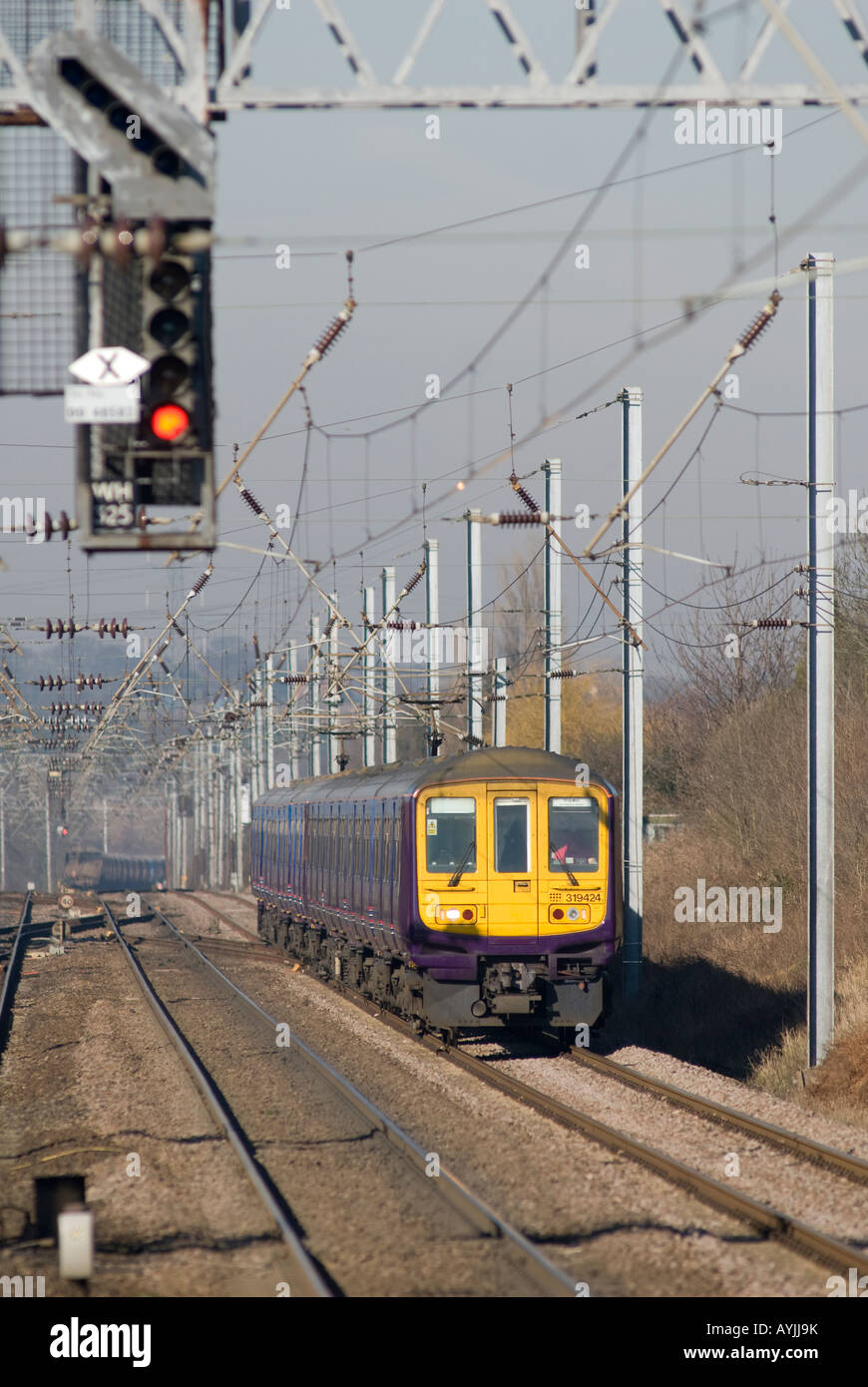 First capital connect class 319 train travelling along track in England ...