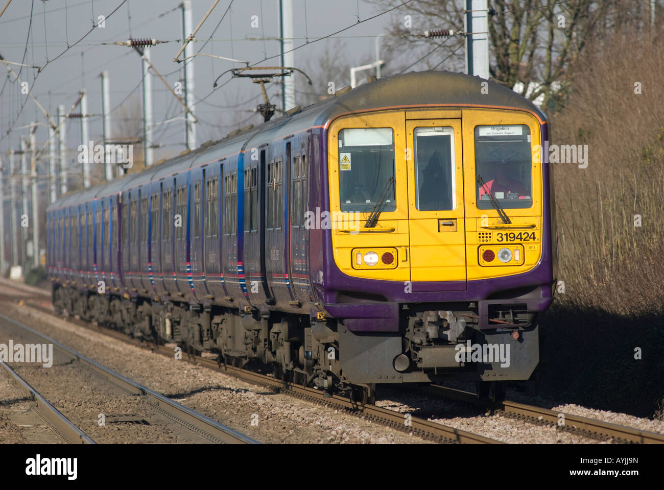first capital connect class 319 train travelling along track in the uk ...