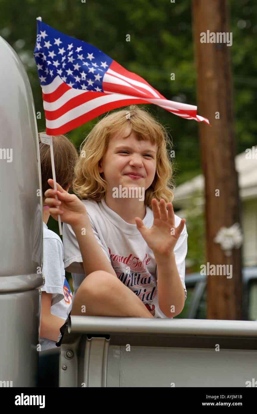 Young Girl Waving American Flag At Independence Day Parade Pekin ...