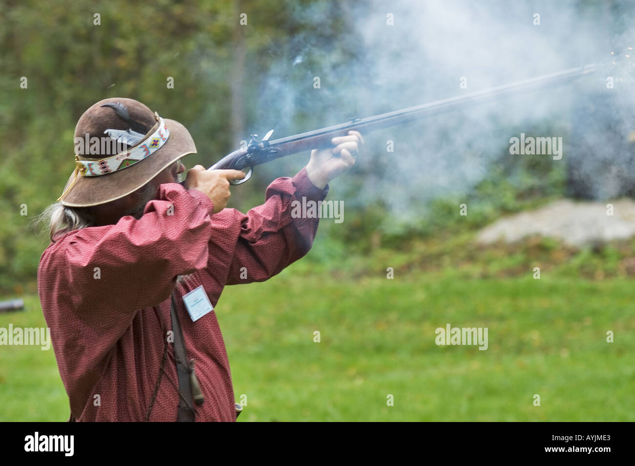 Bearded Man Firing Muzzle Loading Rifle at the The National Muzzle ...