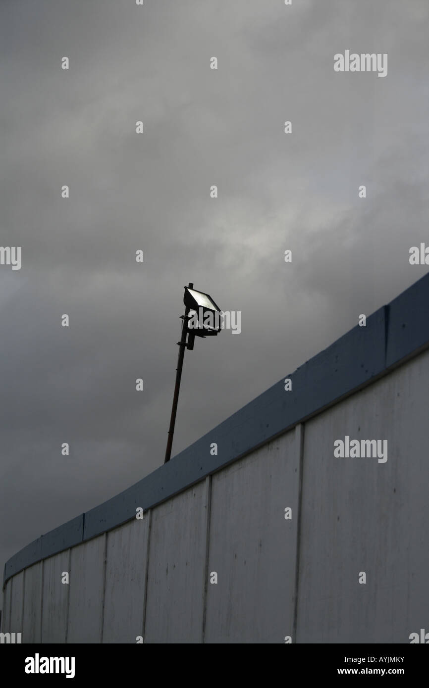 one security light on building site at night Stock Photo - Alamy
