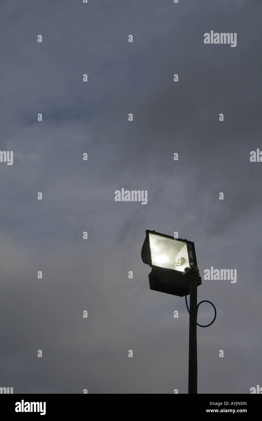 one security light on building site at night Stock Photo - Alamy