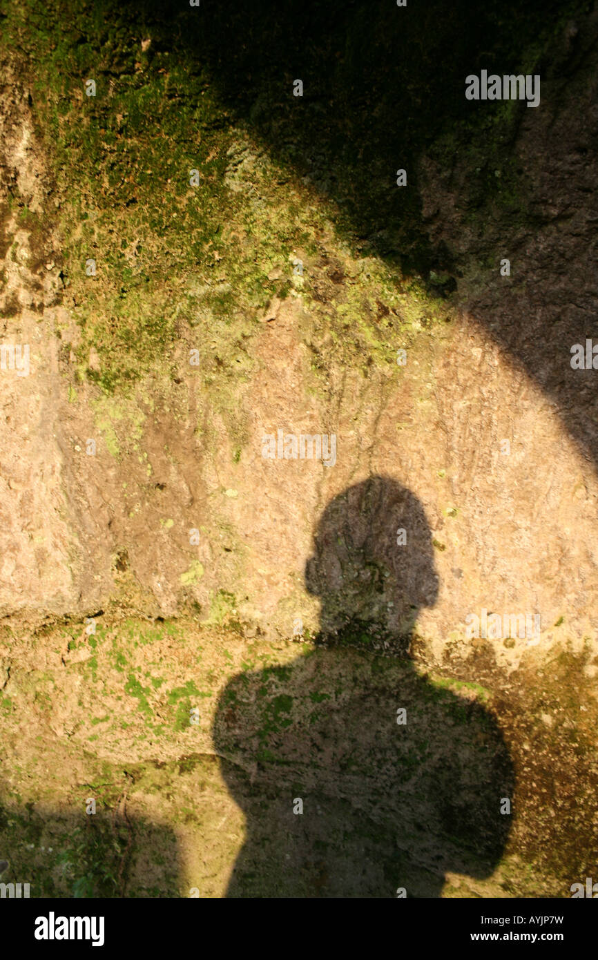 one man's shadow on wall Stock Photo - Alamy
