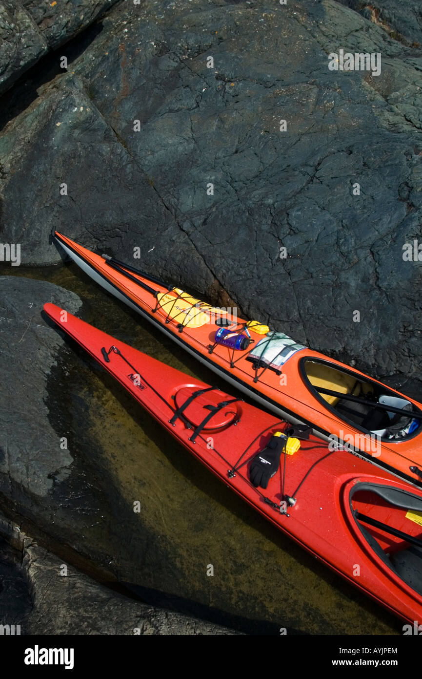 bright coloured kayaks along coast of Lake Superior Stock Photo - Alamy