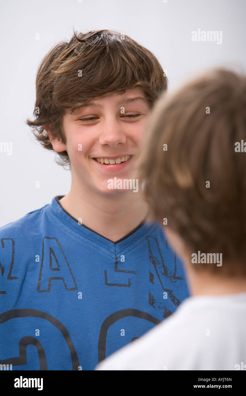 Talking teenager boys Stock Photo - Alamy