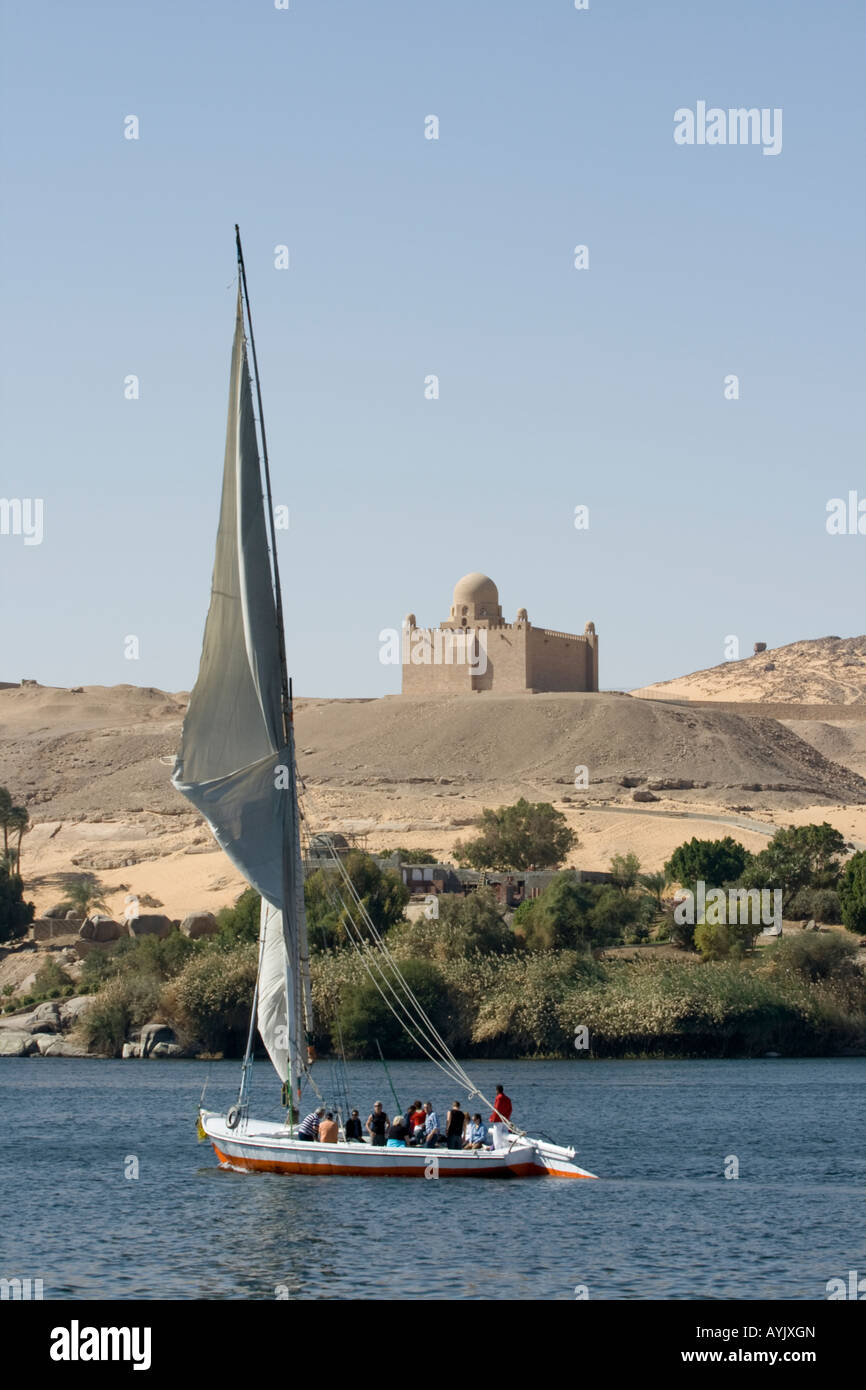 Felucca wiht the mausoleum of the Aga Khan at the back Aswan or Assuan ...