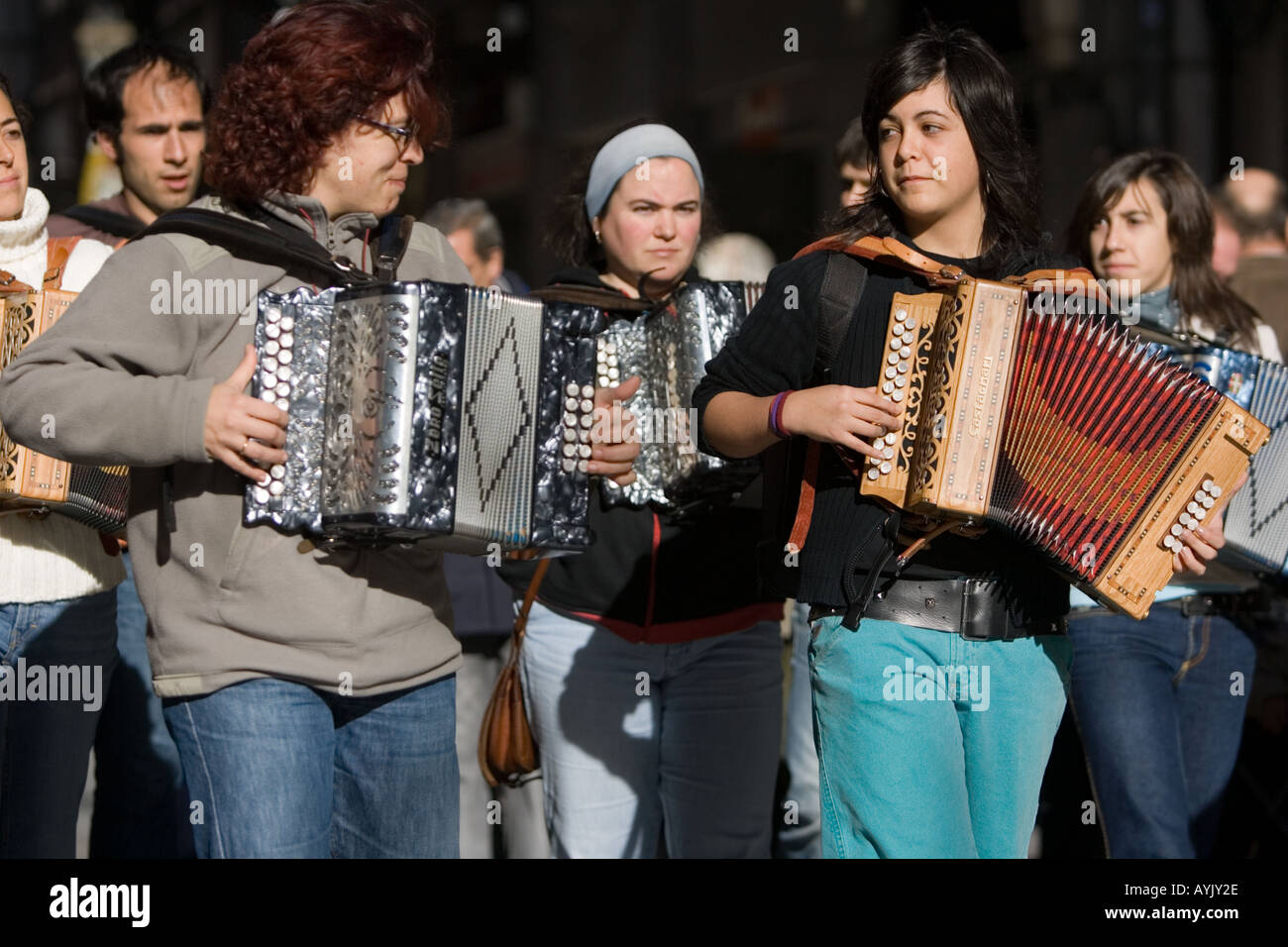 Basque musicians playing traditional instruments as they parade through ...