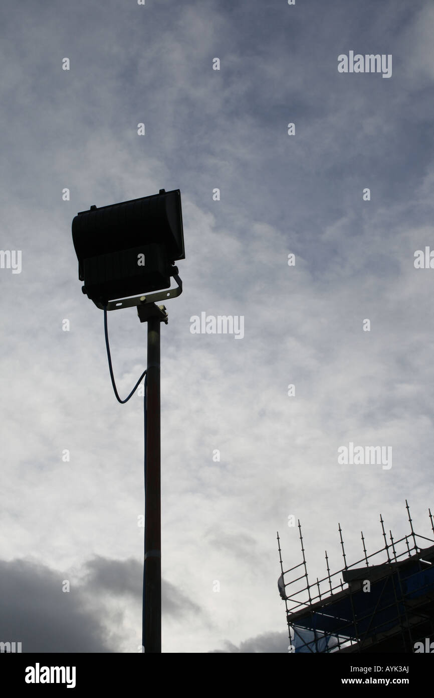 one security light on building site at night Stock Photo - Alamy