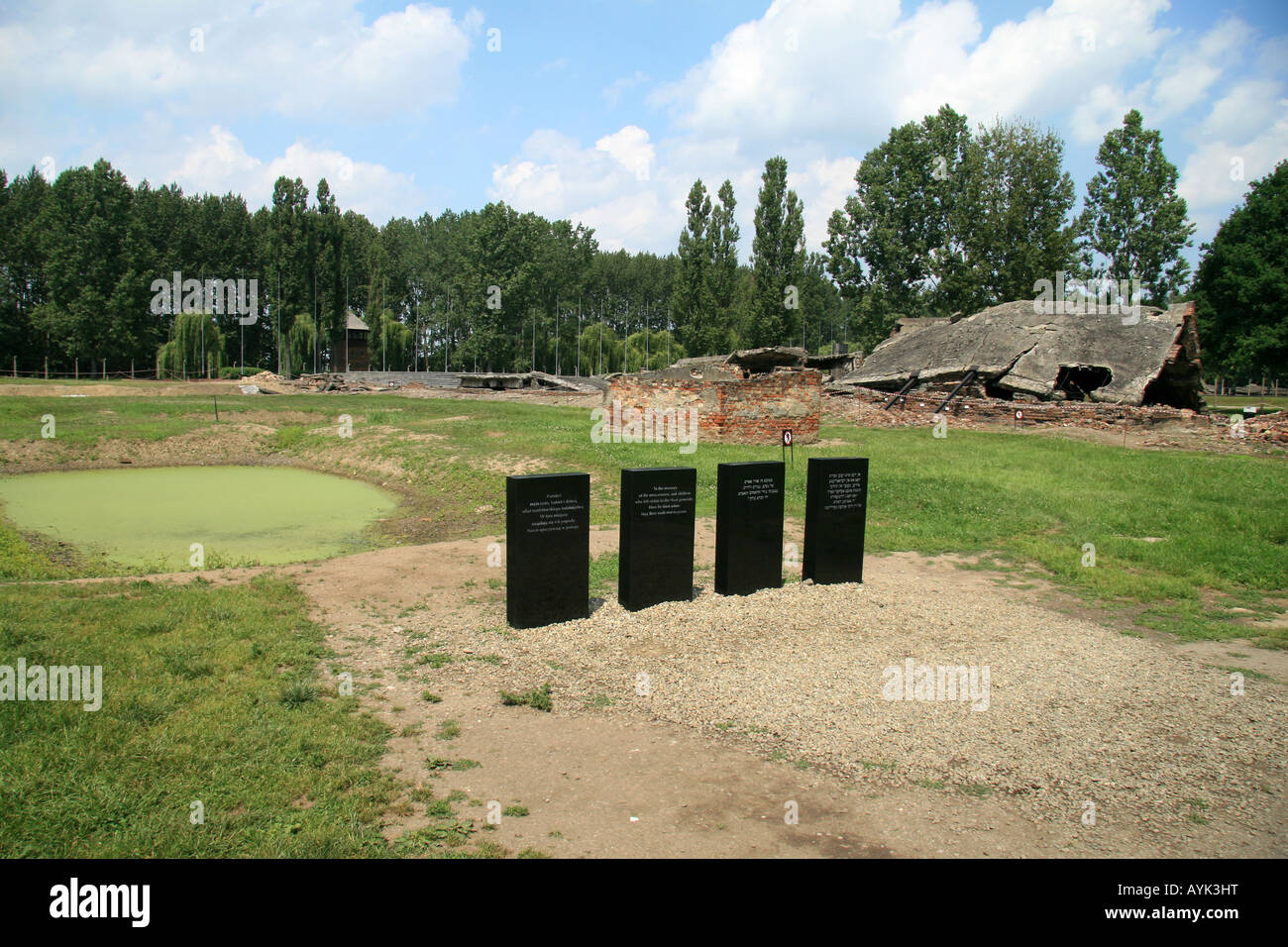 Memorial headstones beside a pond into which the cremation ashes from ...