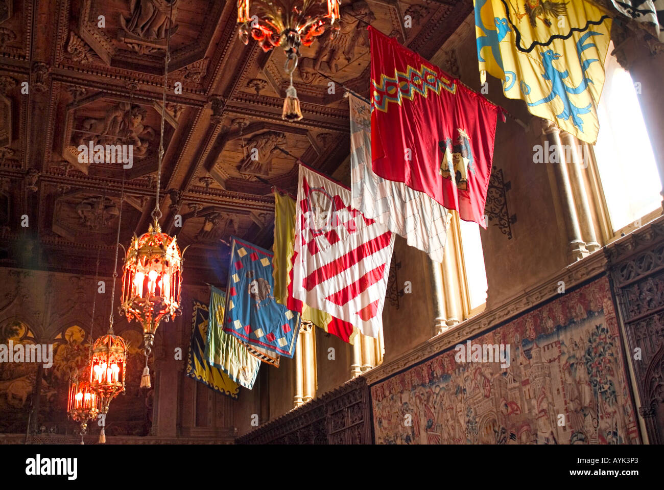 Flags hanging in Hearst Castle Mansion located in San Simeon California ...
