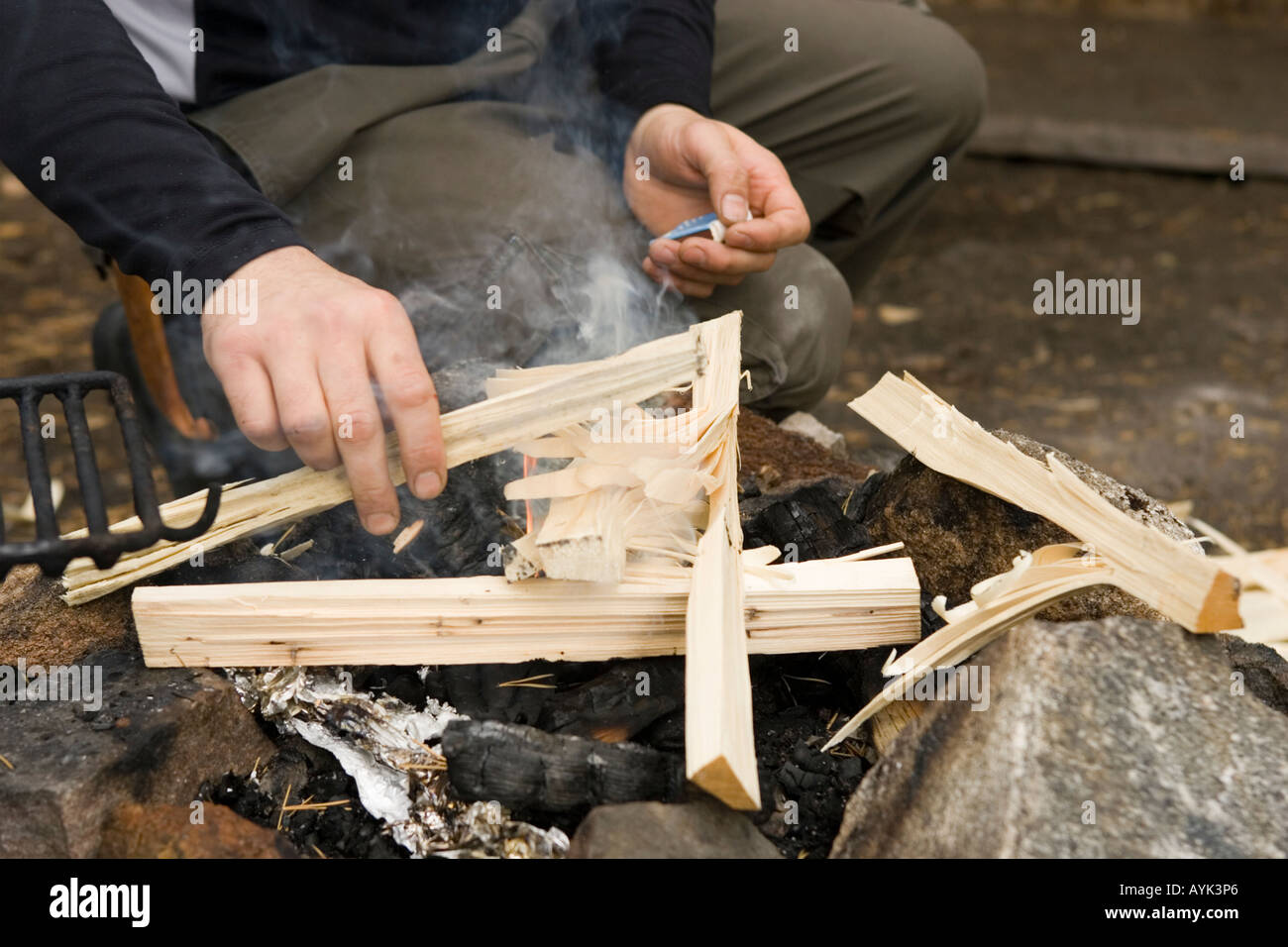 Lighting campfire in hiking area Arctic Circle Hiking Area near ...