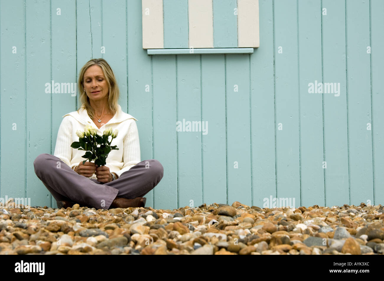 Woman reminisce flowers hi-res stock photography and images - Alamy