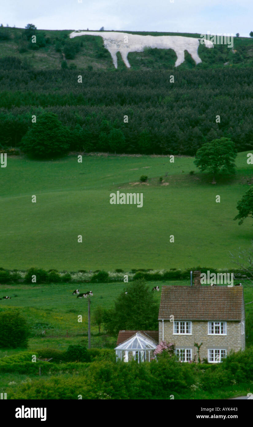 Kilburn White Horse and a stone house with a conservatory, North ...