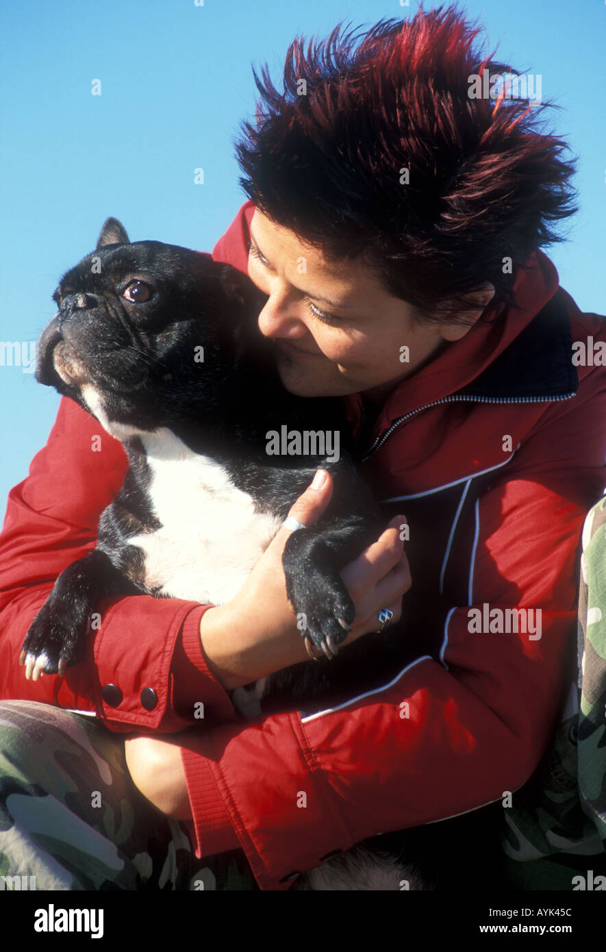 Dutch Girl with French Bulldog Stock Photo - Alamy