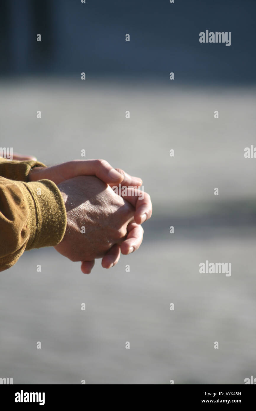 close up of man's hands in town Stock Photo - Alamy
