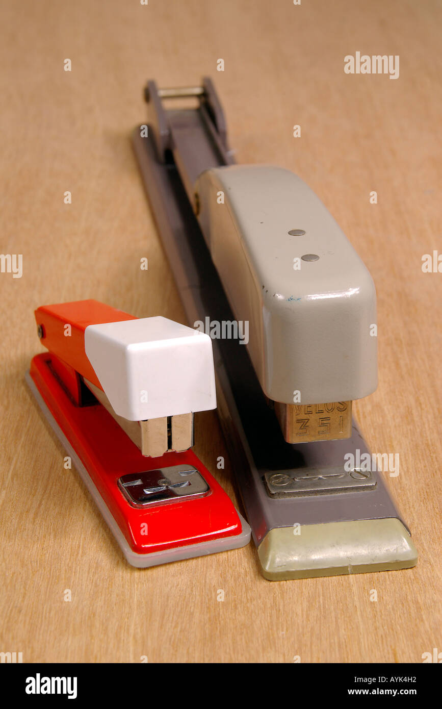 Normal and long arm stapling machines Stock Photo - Alamy