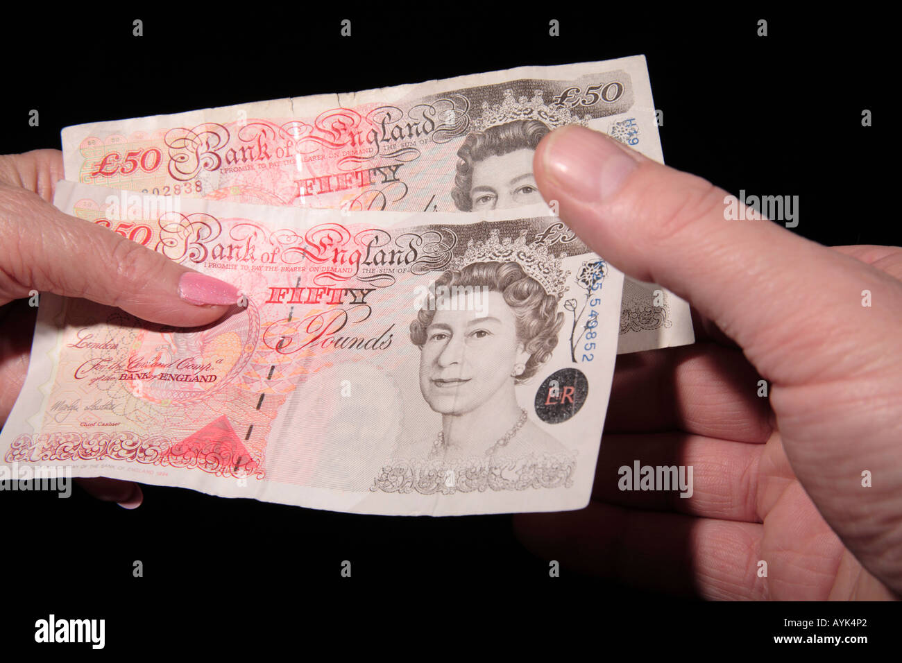 Handing over money hi-res stock photography and images - Alamy