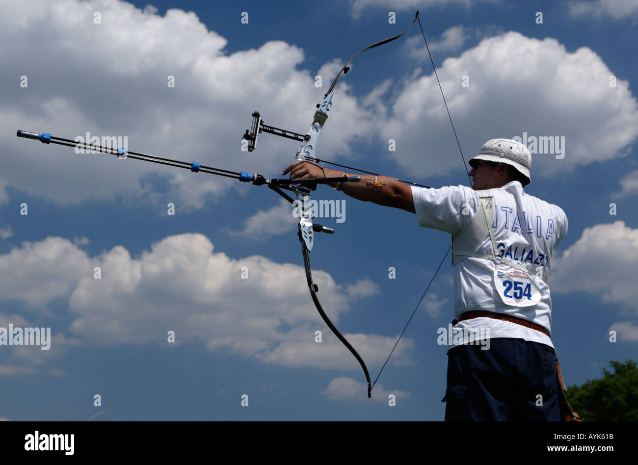 Man competing in an archery competition Stock Photo - Alamy