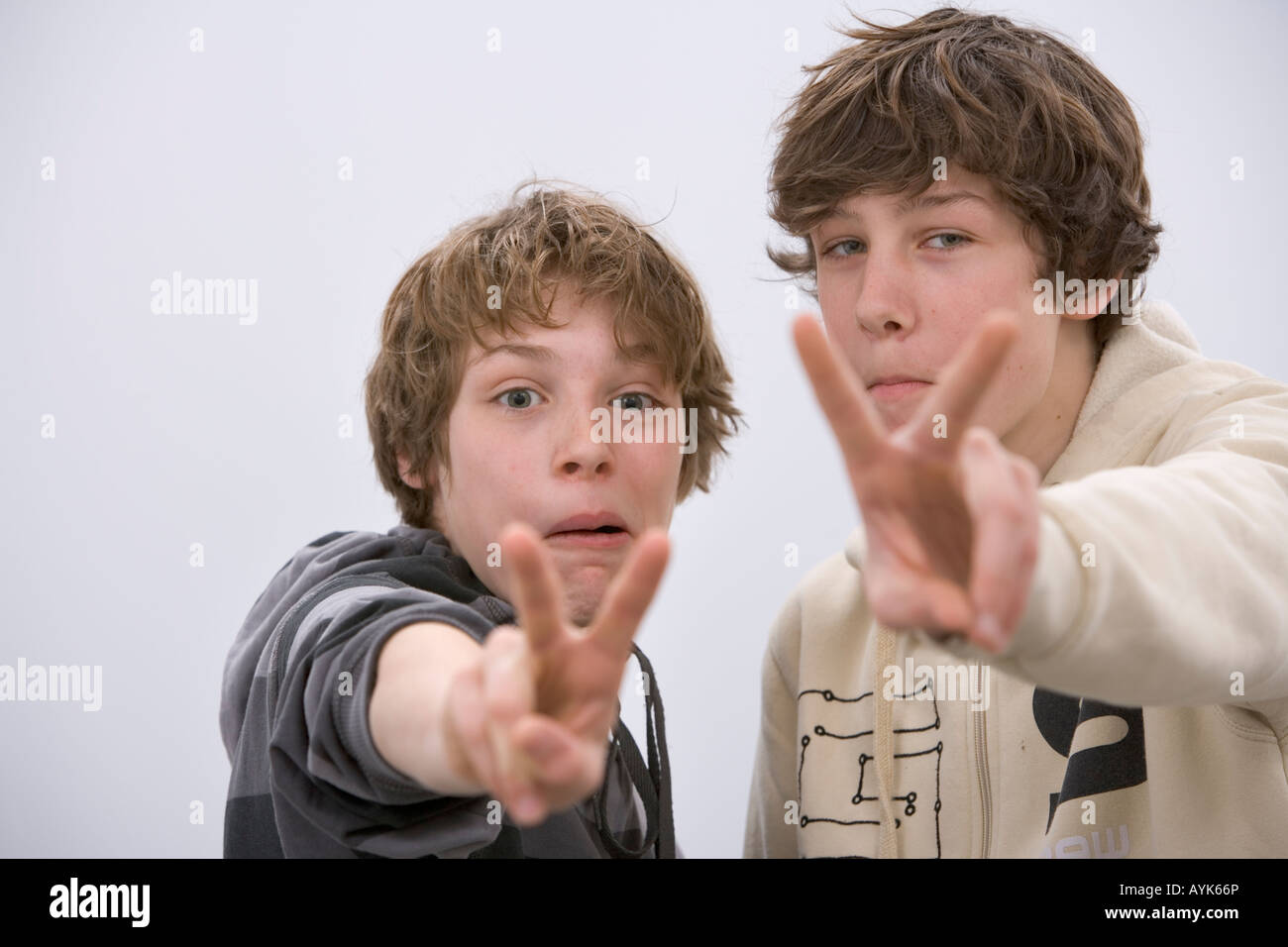 Two teenage boys making fun Stock Photo - Alamy